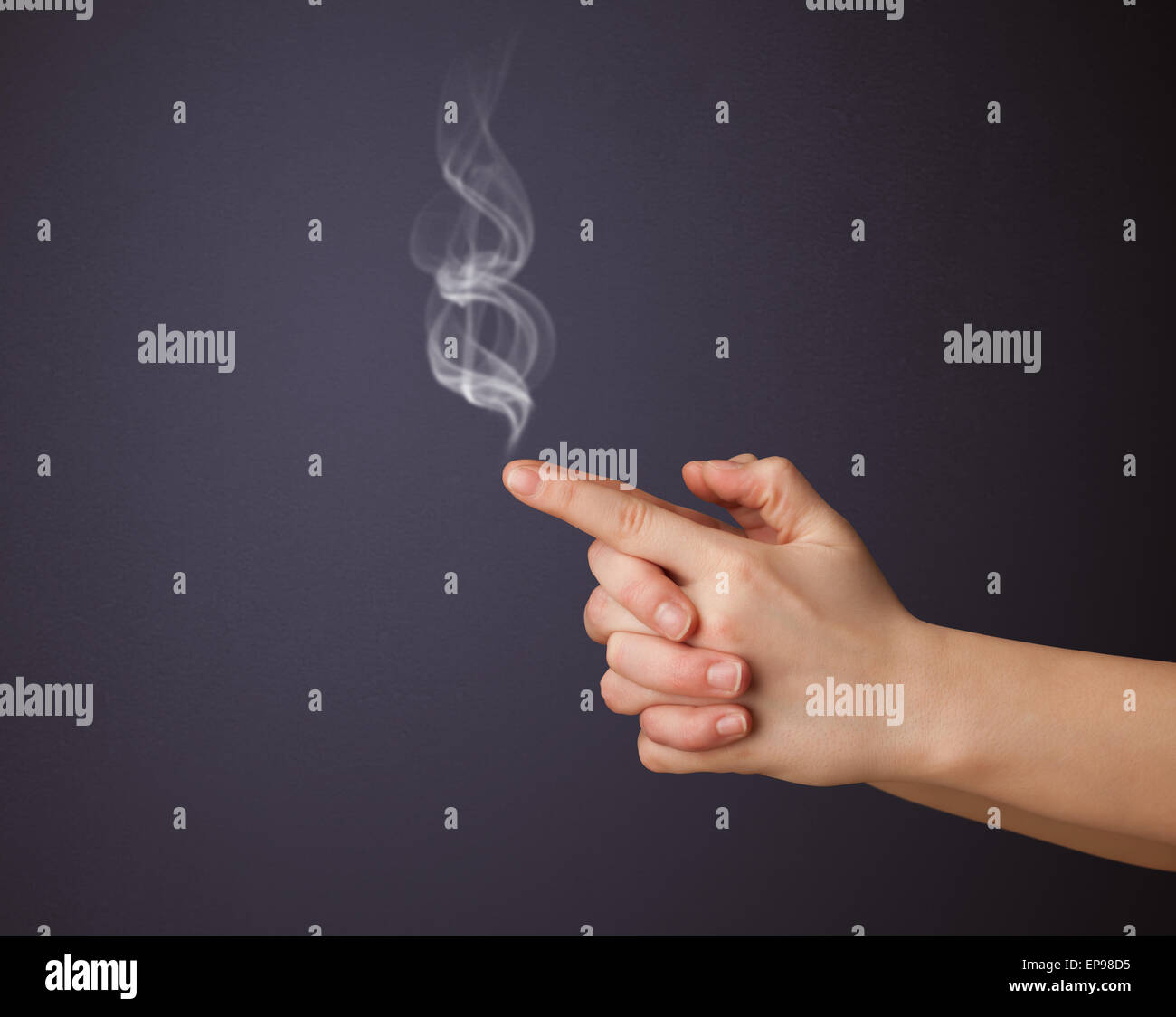 Gun shaped woman hand Stock Photo - Alamy