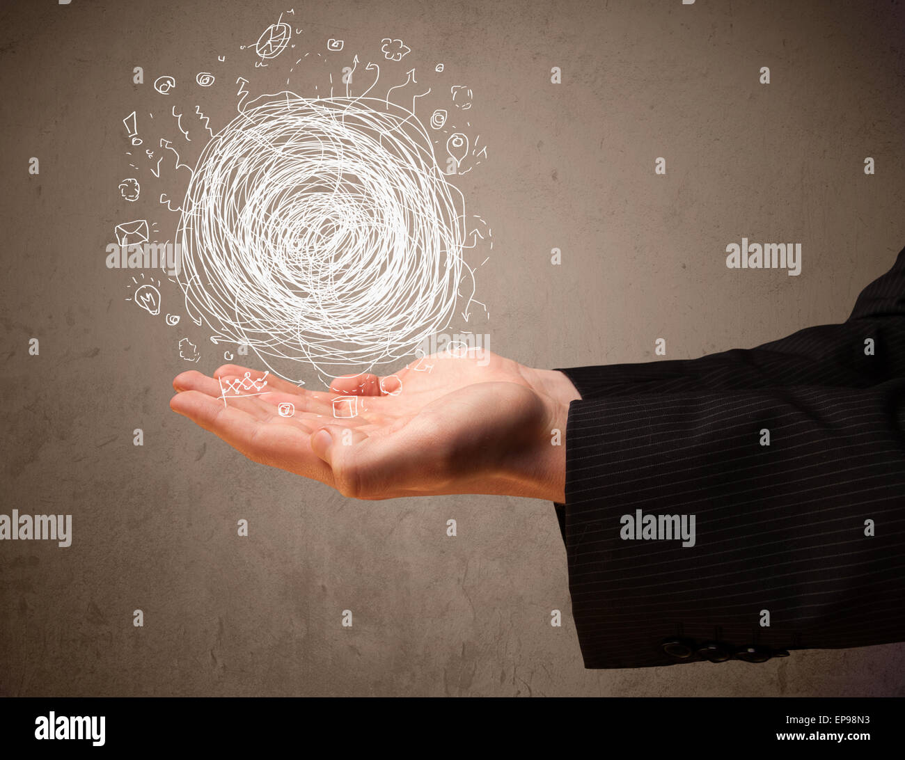 Chaos concept in the hand of a businessman Stock Photo - Alamy