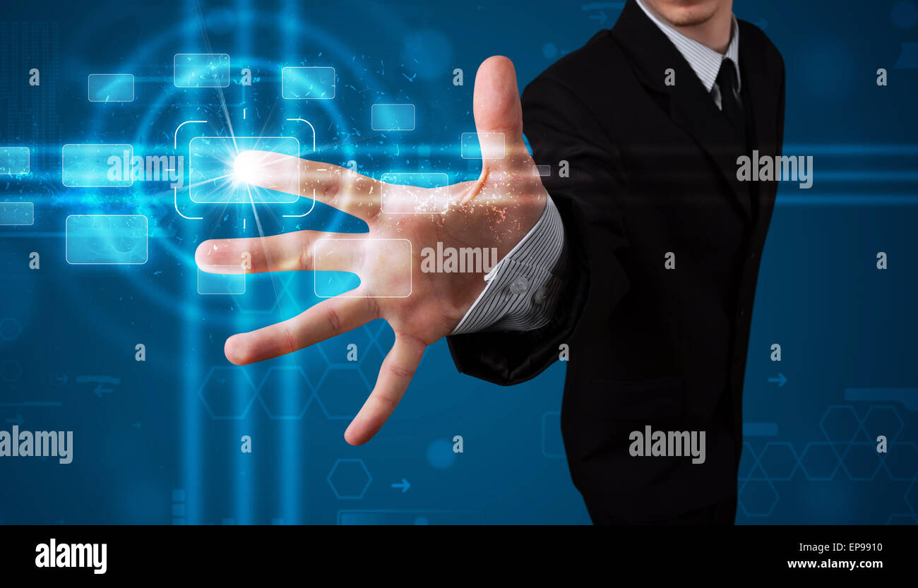 Businessman pressing high tech type of modern buttons Stock Photo - Alamy