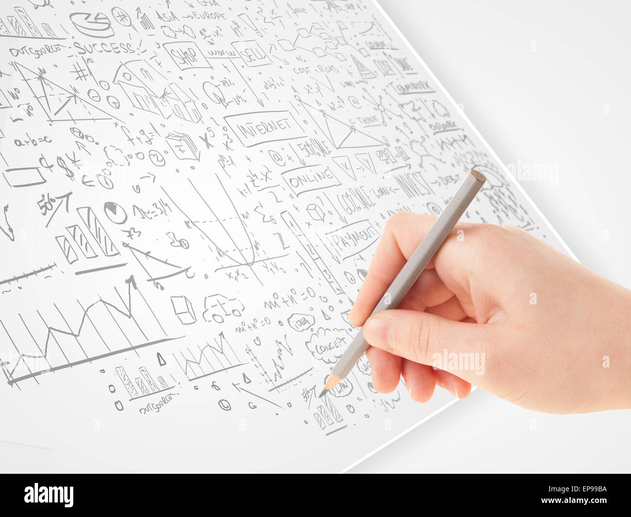 Human hand sketching ideas on a white paper Stock Photo - Alamy