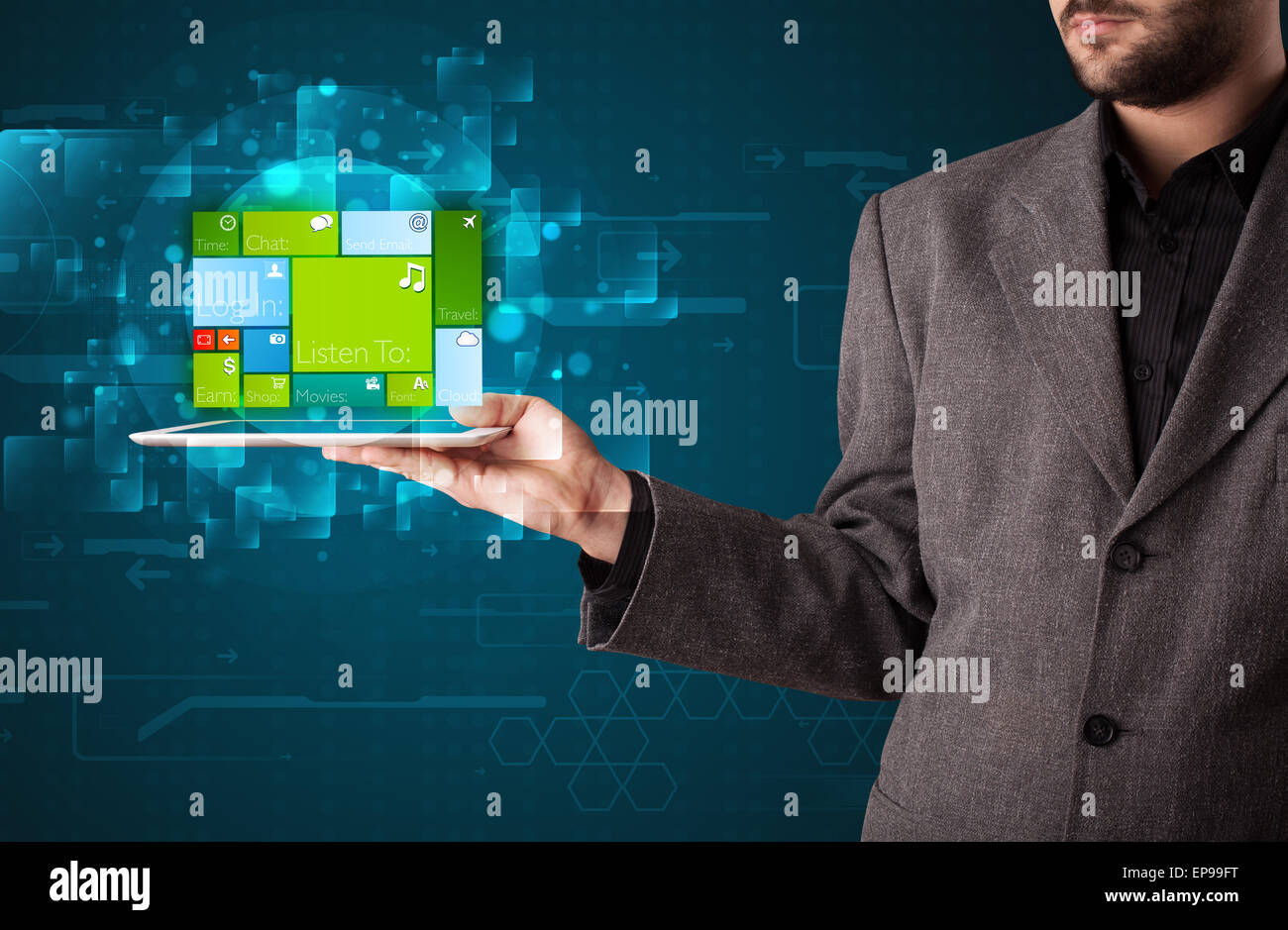 Businessman holding a tablet with modern software operational system ...