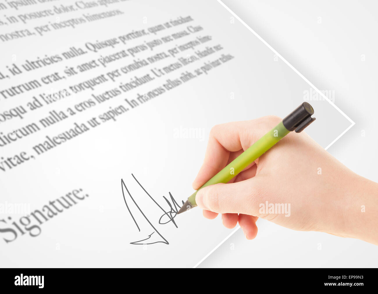 Hand writing personal signature on a paper form Stock Photo - Alamy