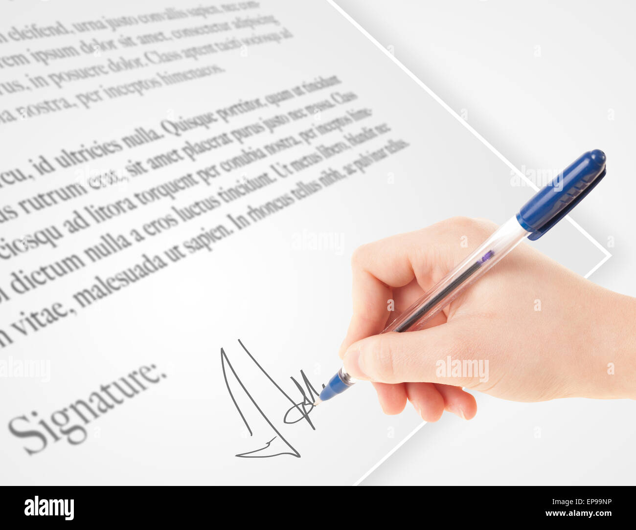 Hand writing personal signature on a paper form Stock Photo - Alamy