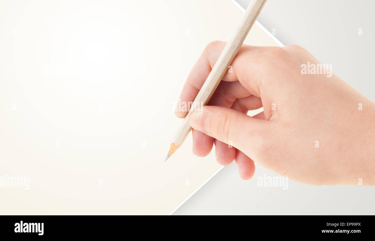 Human hand drawing with pencil on empty paper template Stock Photo - Alamy