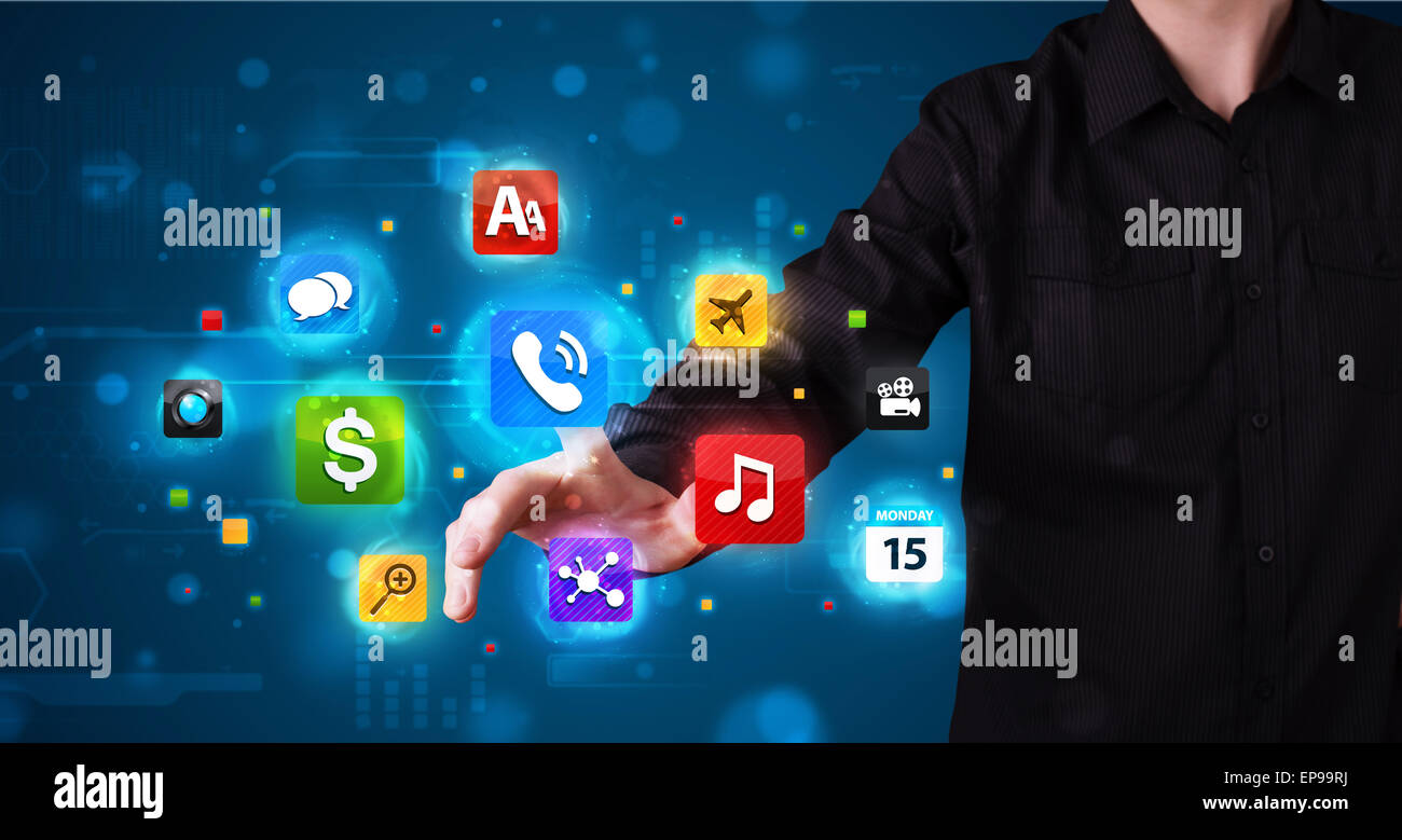 Man pressing various collection of high tech buttons Stock Photo - Alamy