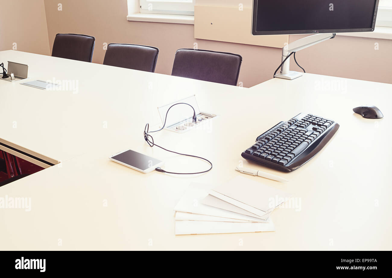Interior of a modern office, furniture in white and computer hardware ...