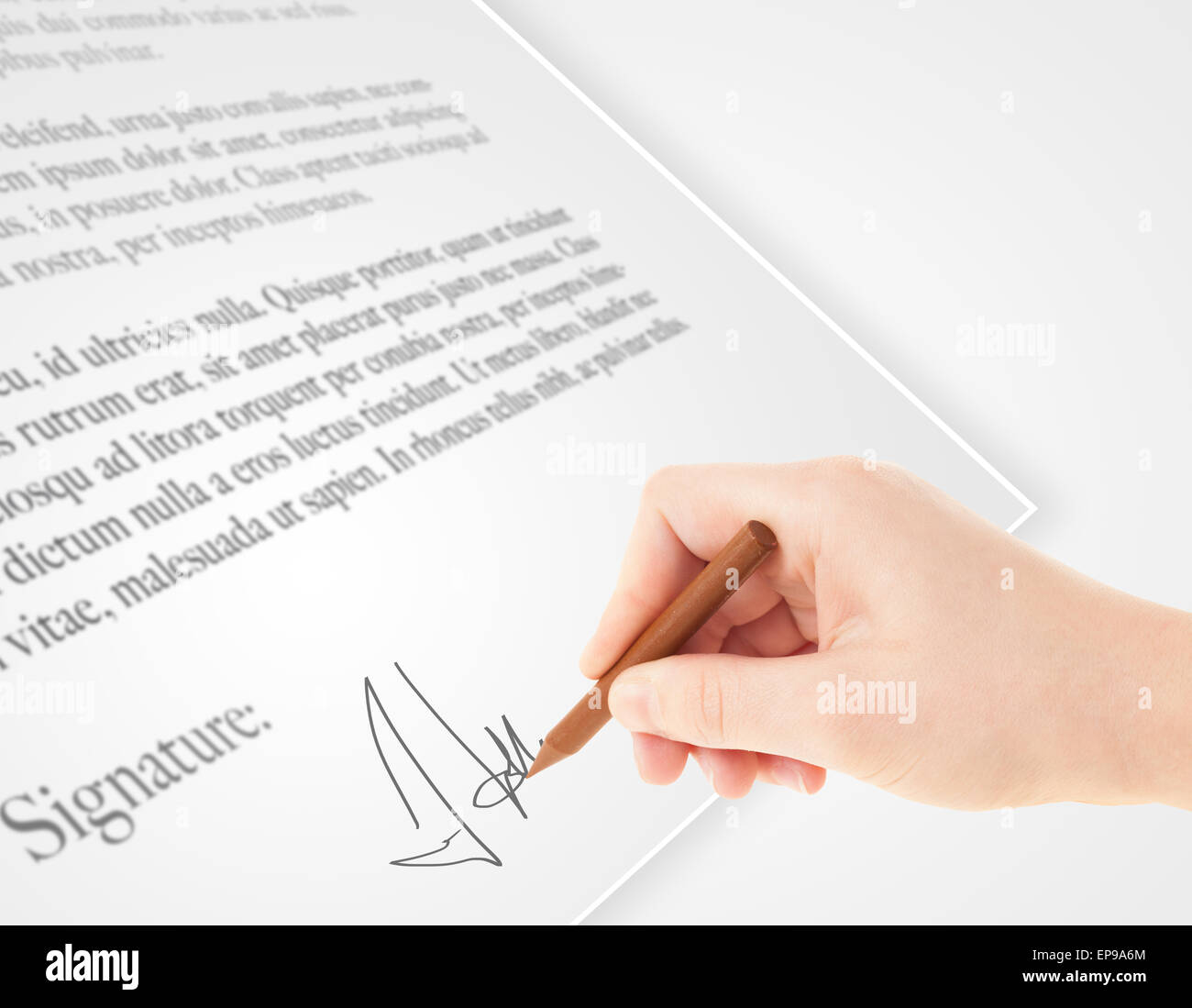 Hand writing personal signature on a paper form Stock Photo - Alamy