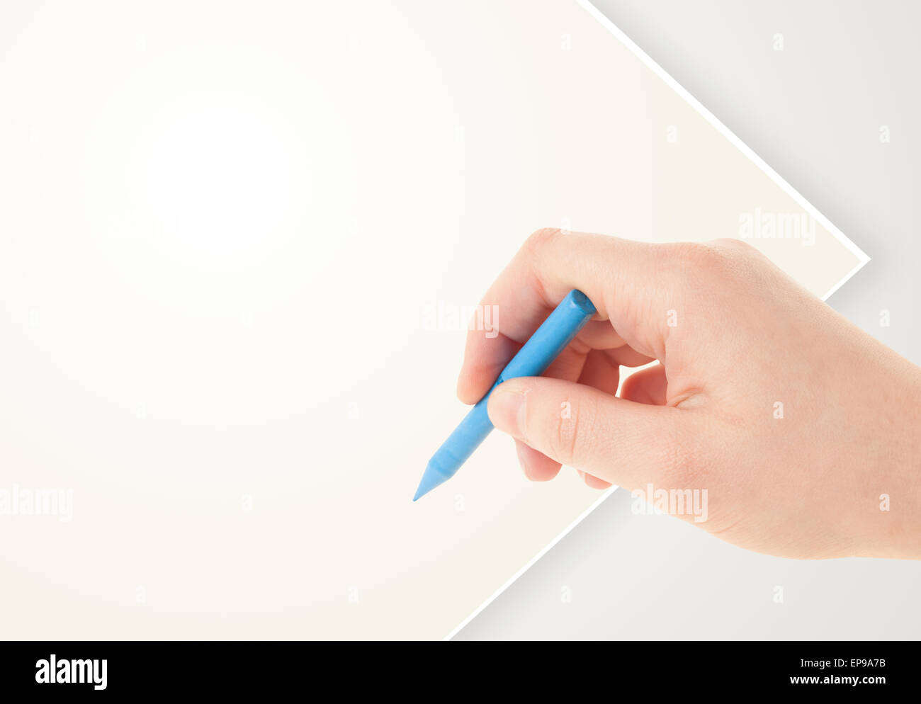 Child drawing with colorful crayon on empty blank paper Stock Photo - Alamy