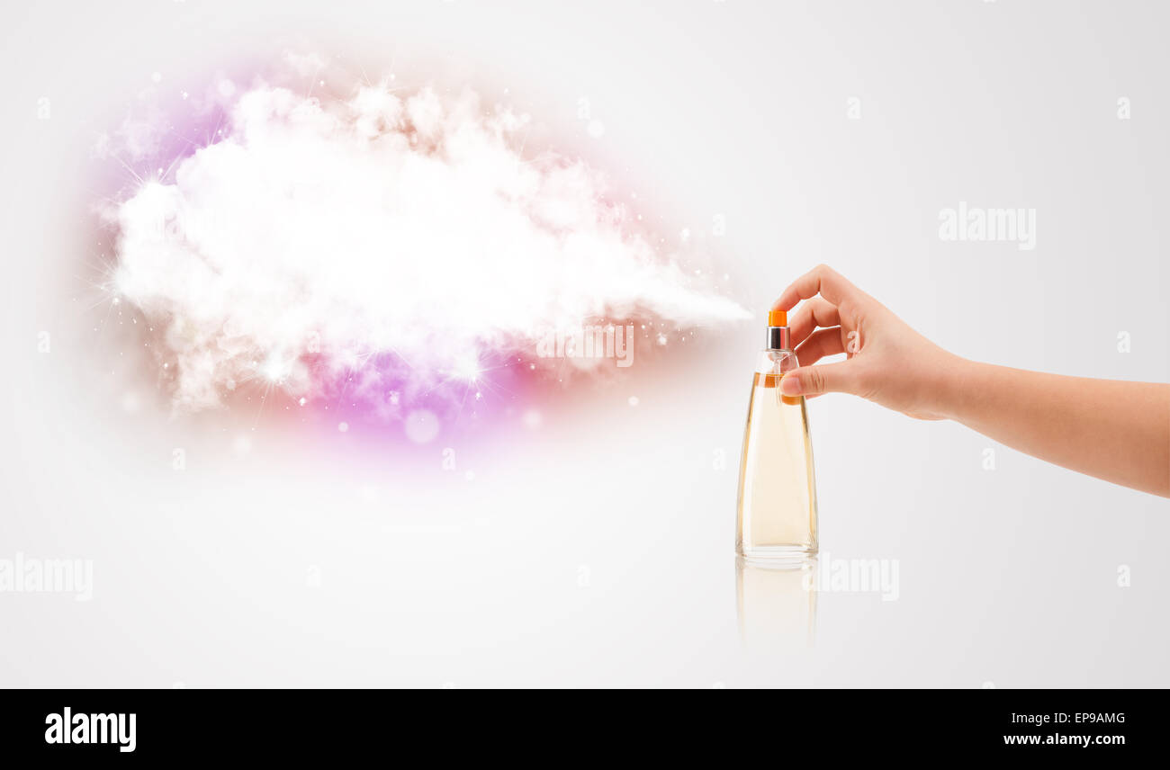 woman hands spraying colorful cloud Stock Photo - Alamy