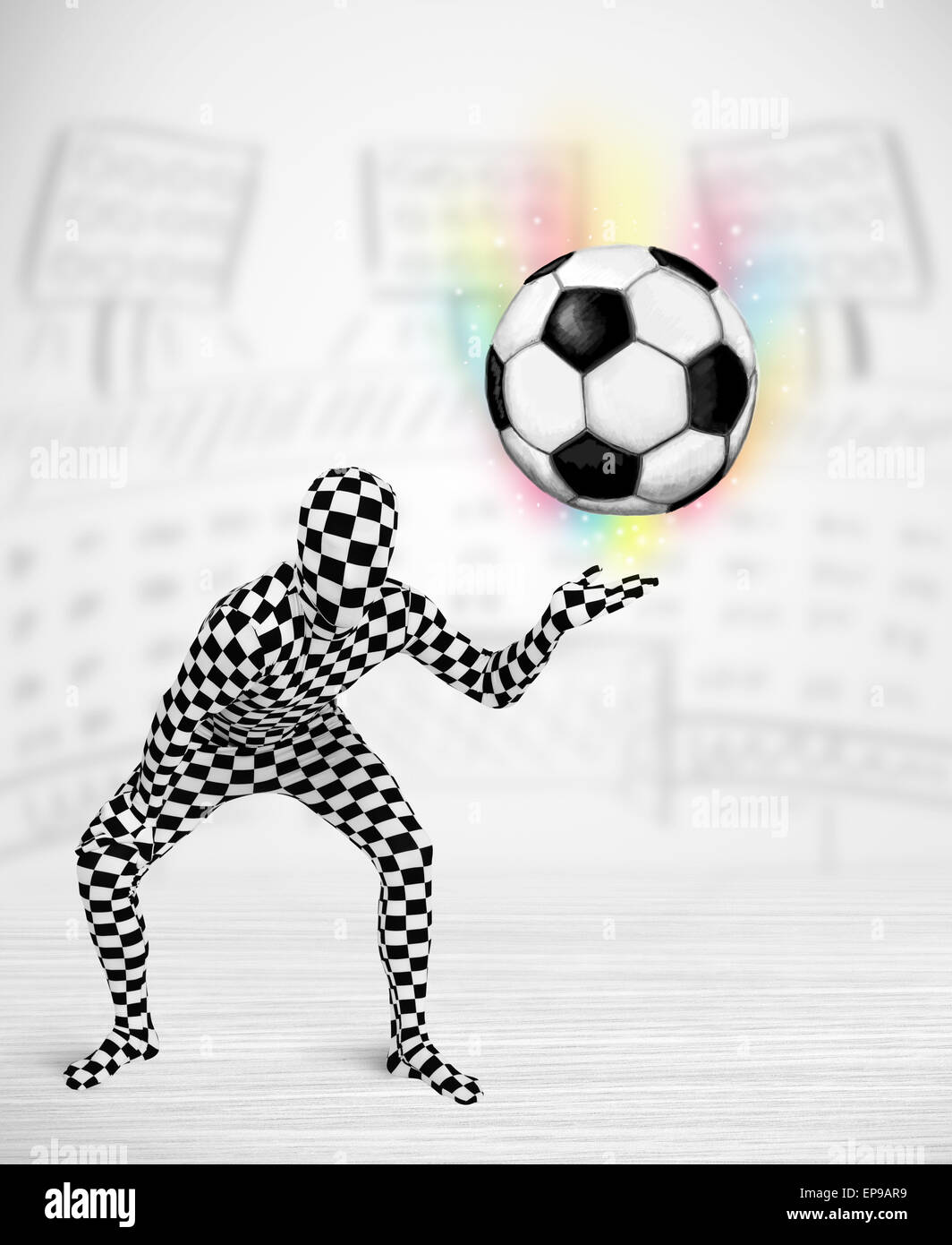 man in full body suit holdig soccer ball Stock Photo - Alamy