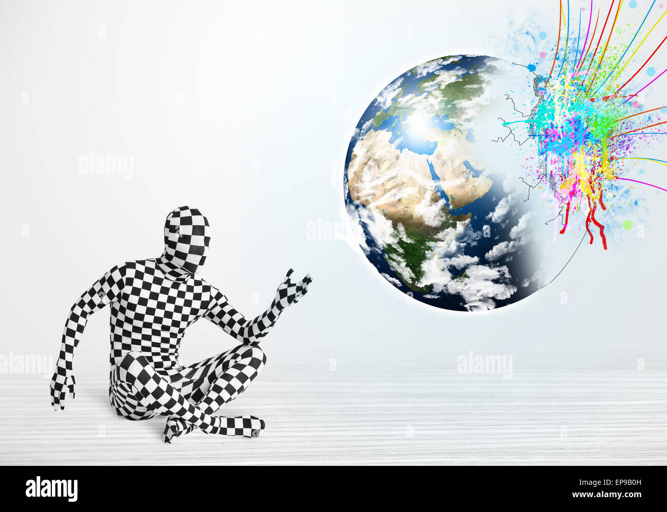 Funny man in body suit looking at colorful splatter earth Stock Photo ...