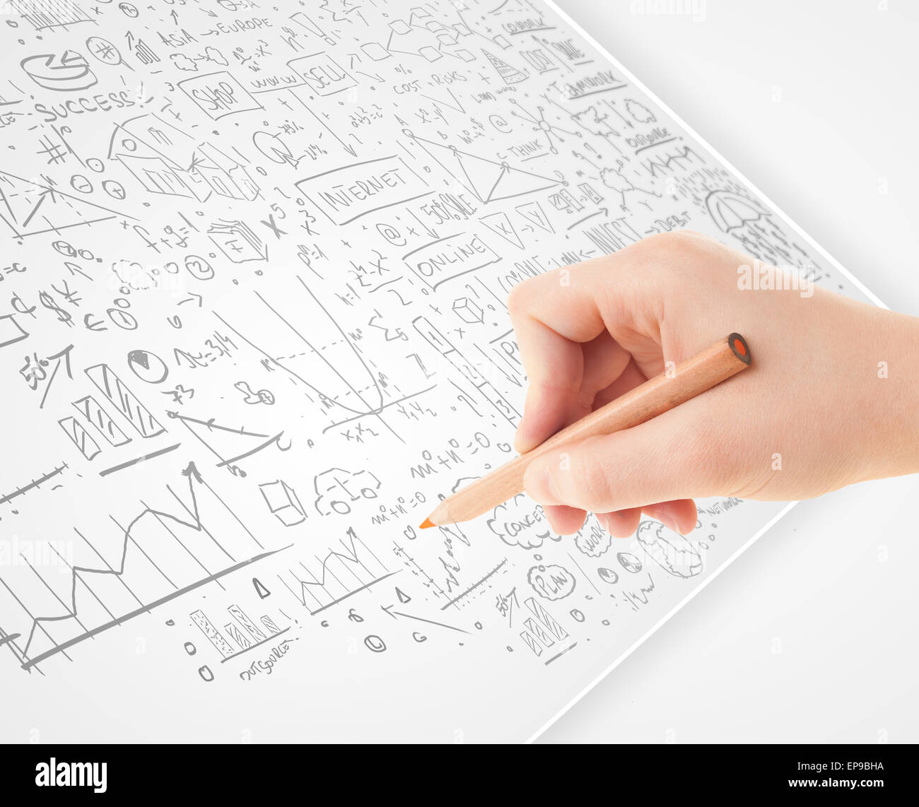 Human hand sketching ideas on a white paper Stock Photo - Alamy