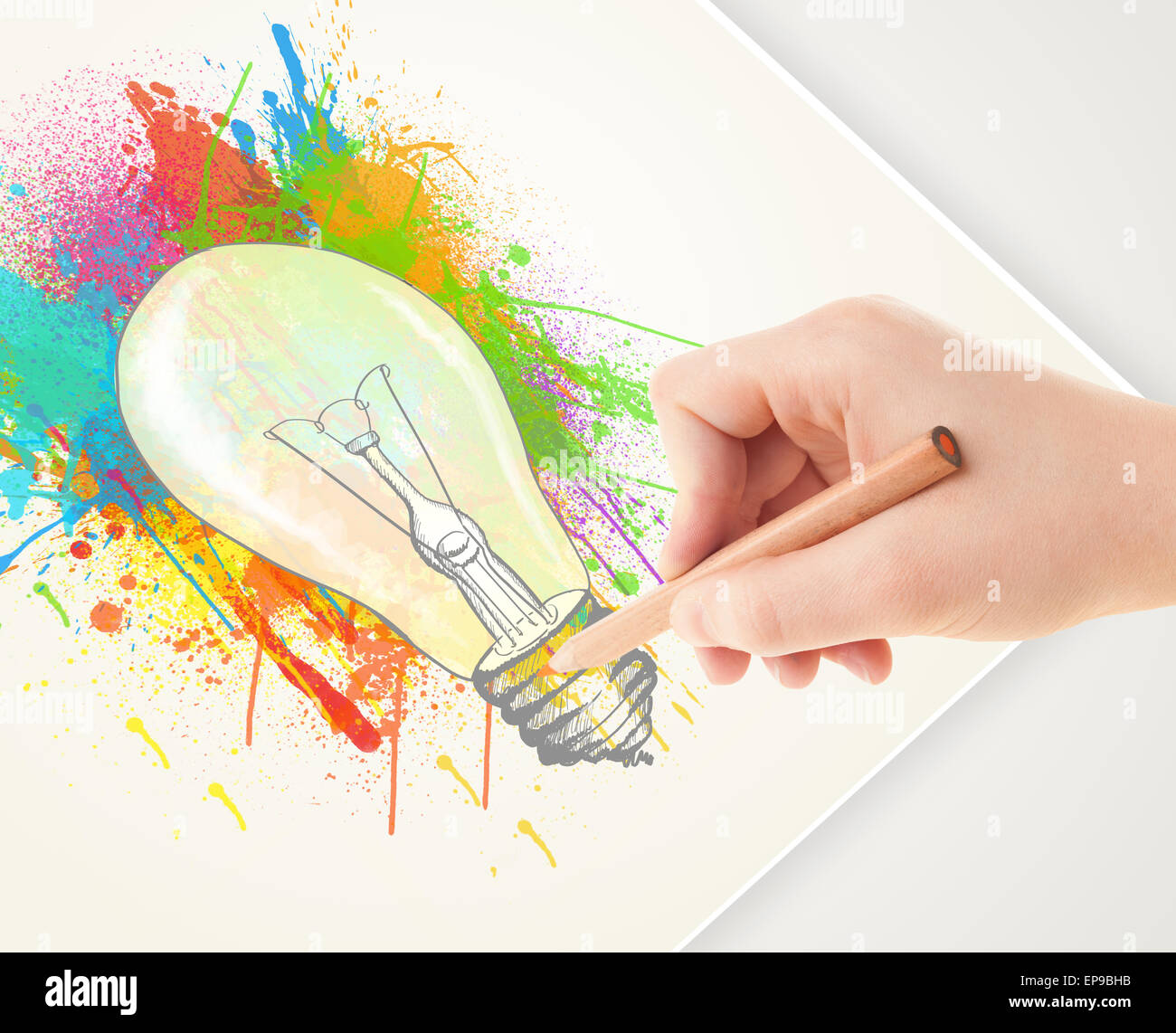 Hand drawing on paper a colorful splatter lightbulb Stock Photo - Alamy