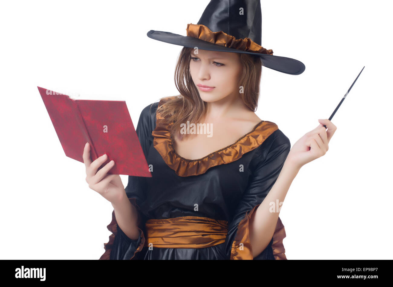 Witch with wand and book isolated on white Stock Photo - Alamy