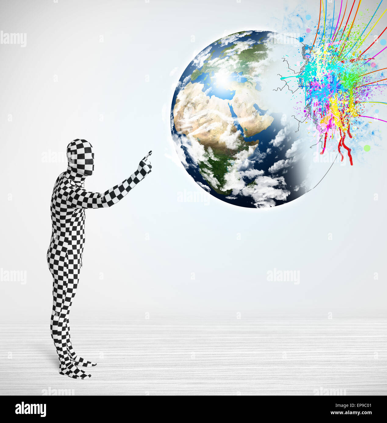 Funny man in body suit looking at colorful splatter earth Stock Photo ...