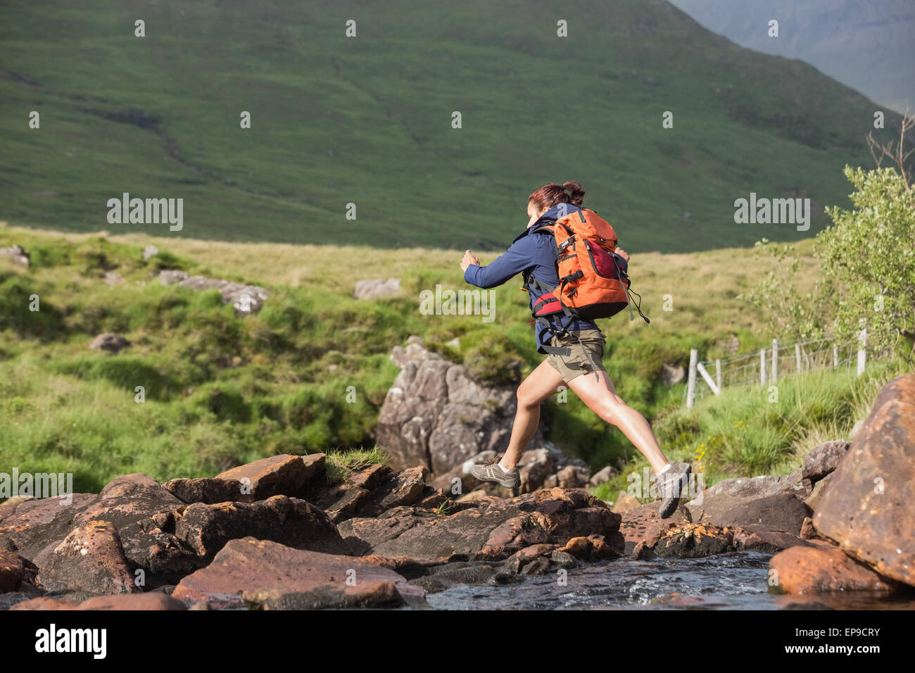 Leaping across river hi-res stock photography and images - Alamy