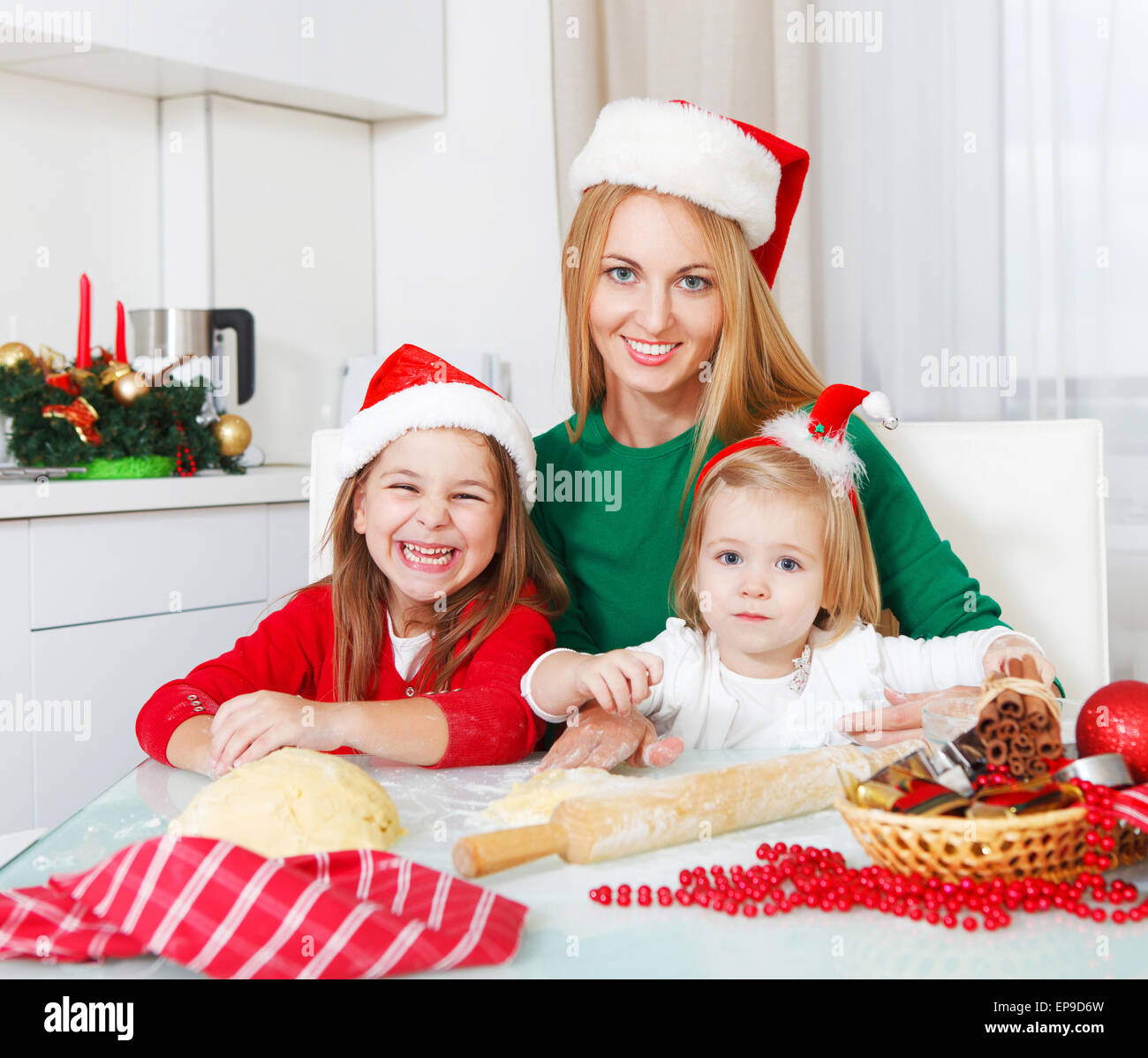 Two girls baking cake in hi-res stock photography and images - Alamy