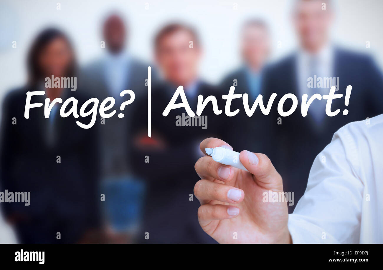 Buisnessman writing frage and antwort with a marker Stock Photo - Alamy