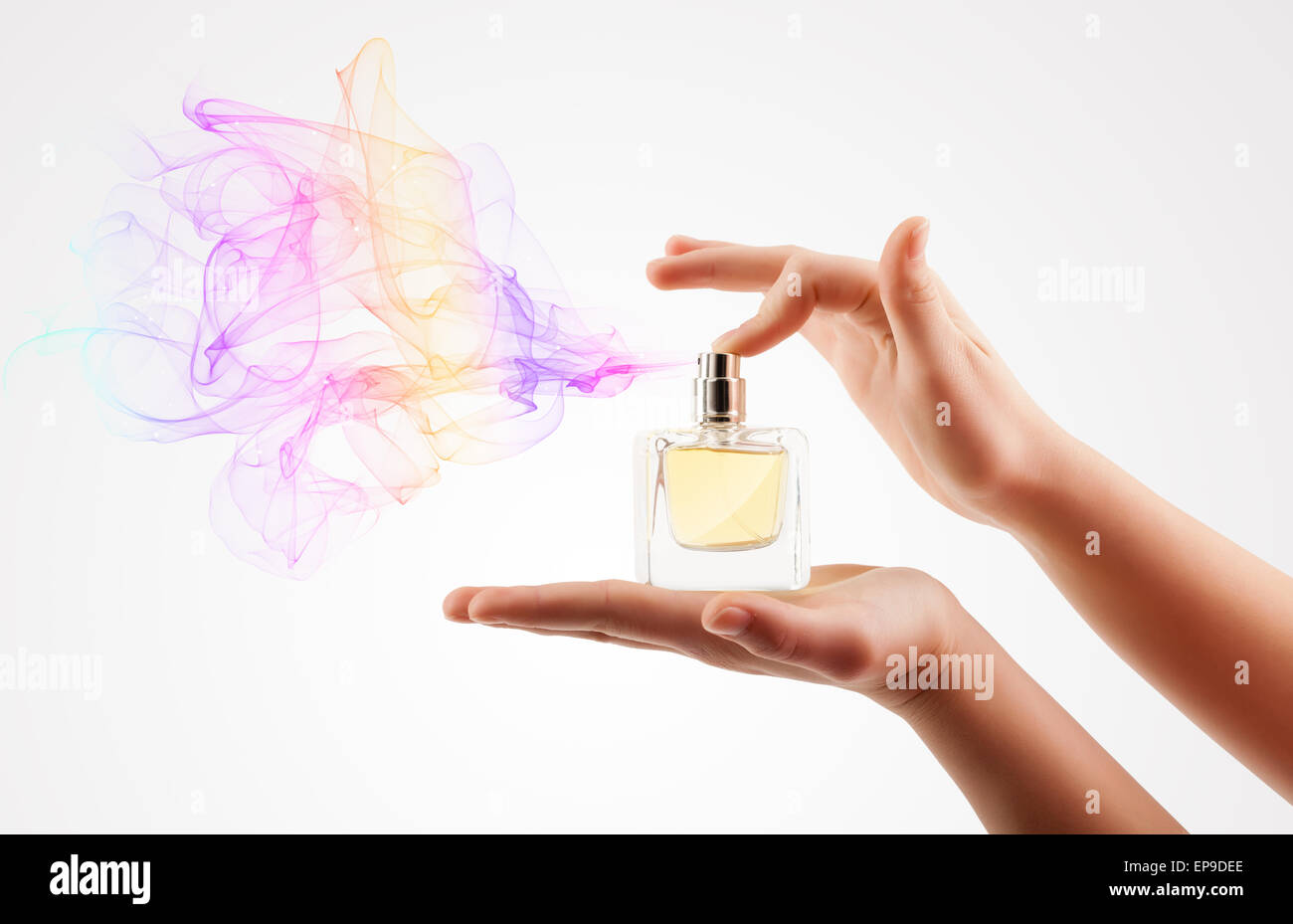 woman hands spraying perfume Stock Photo - Alamy