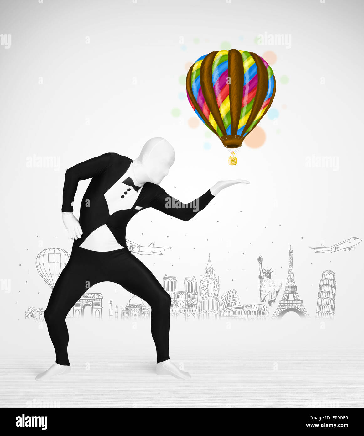 man in full body suit holding balloon Stock Photo - Alamy