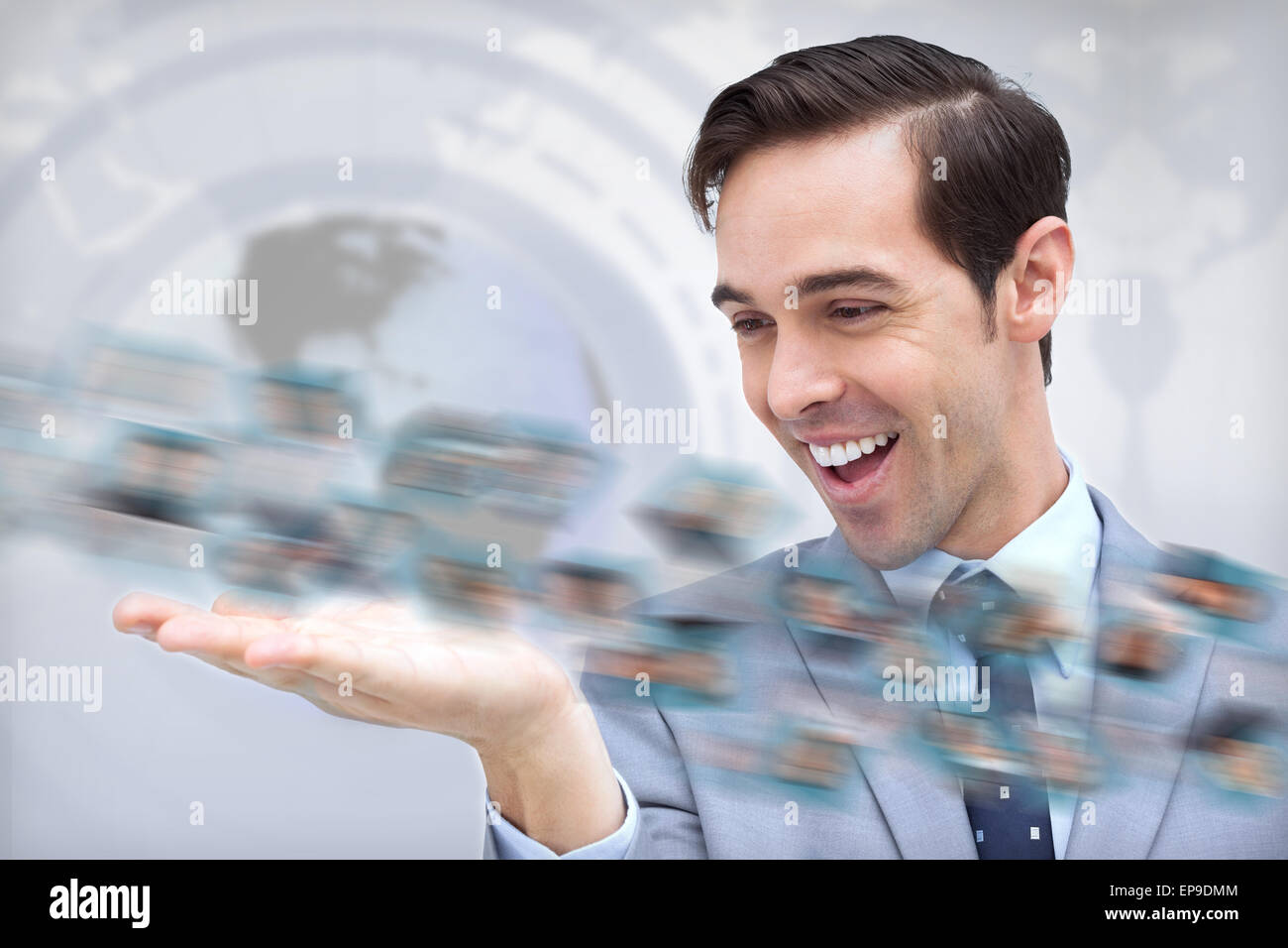 Pleased businessman looking at a picture whirl Stock Photo - Alamy