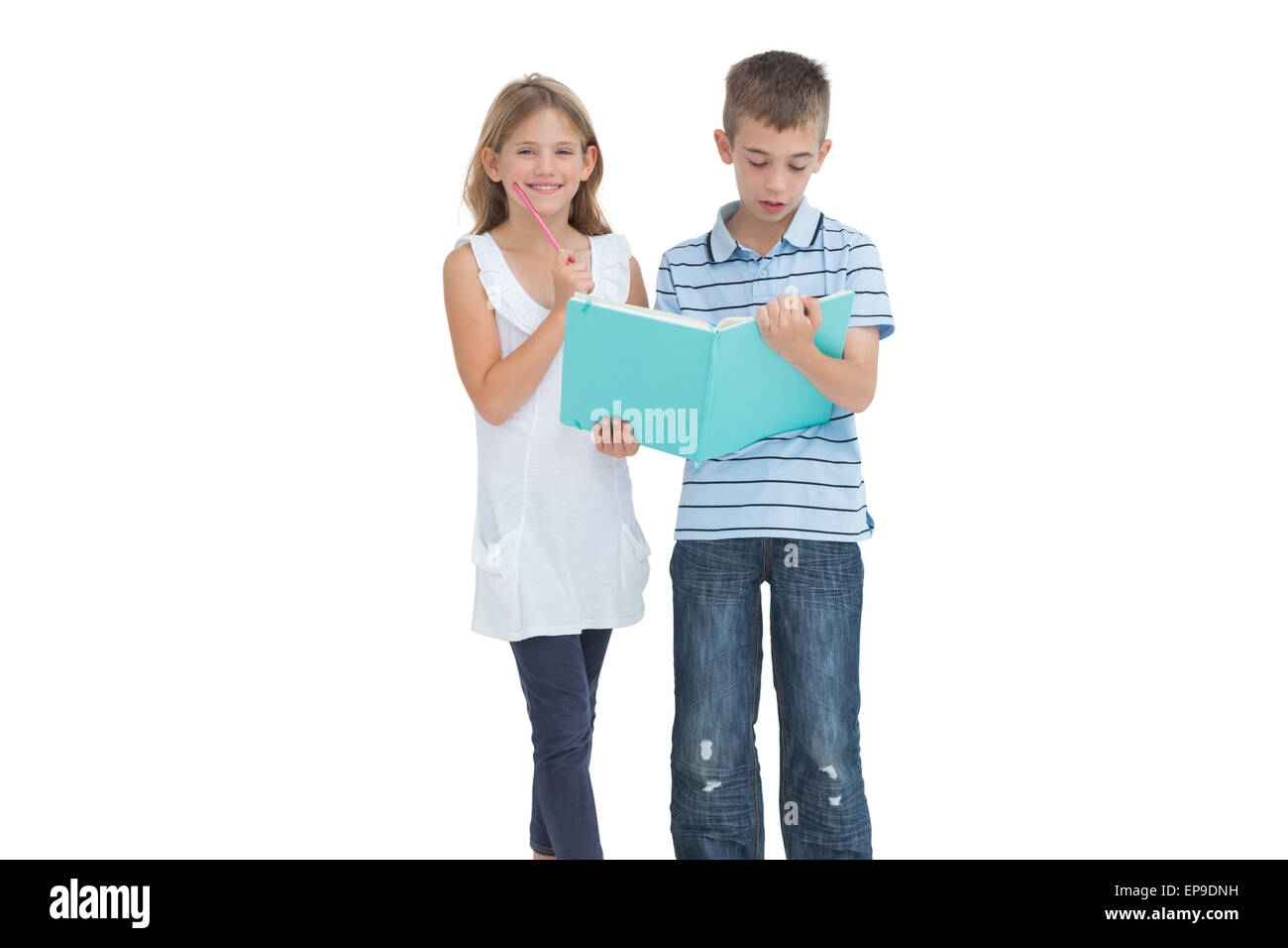 Brother and sister learning their lesson together Stock Photo - Alamy