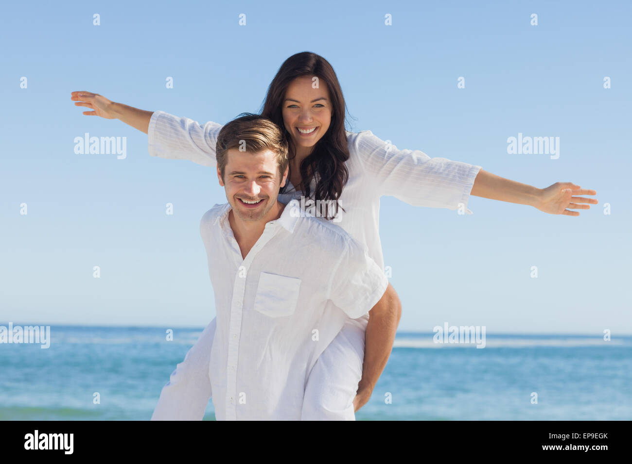 Woman on mans shoulders hi-res stock photography and images - Alamy