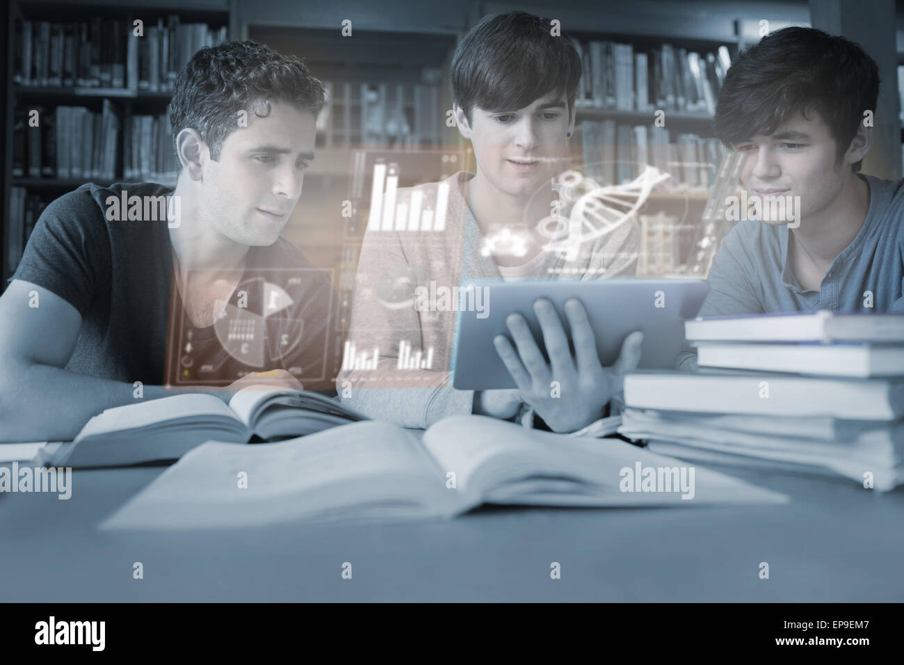 Serious young men studying medicine together with futuristic interface ...