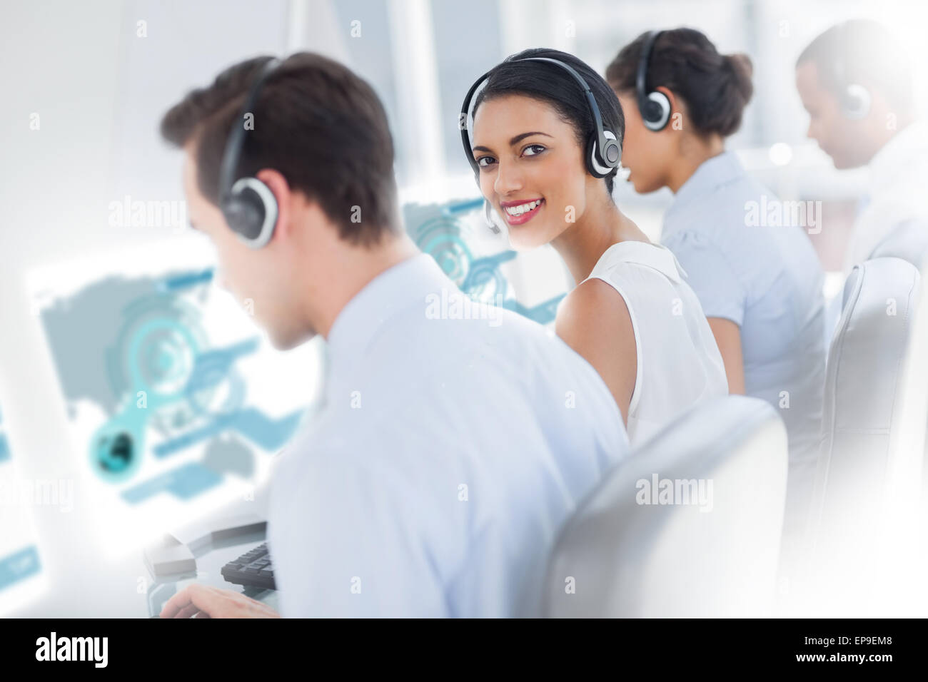 Pretty call center worker using futuristic interface hologram Stock ...