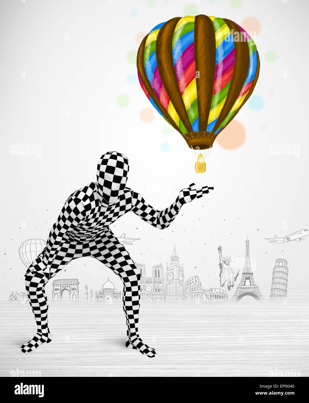 man in full body suit holding balloon Stock Photo - Alamy