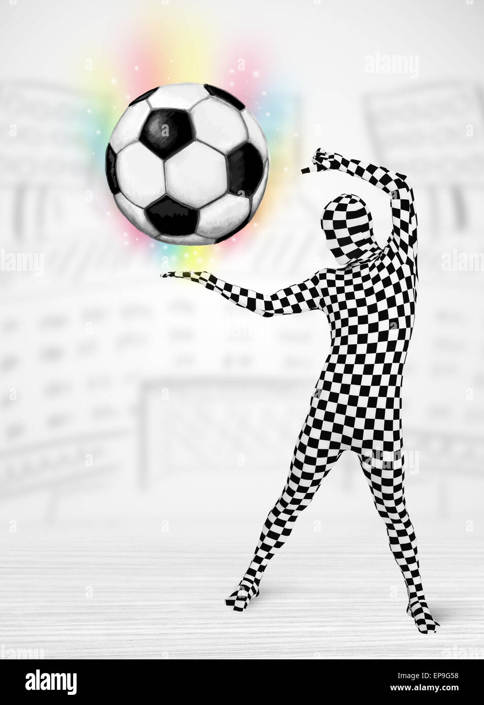man in full body suit holdig soccer ball Stock Photo - Alamy
