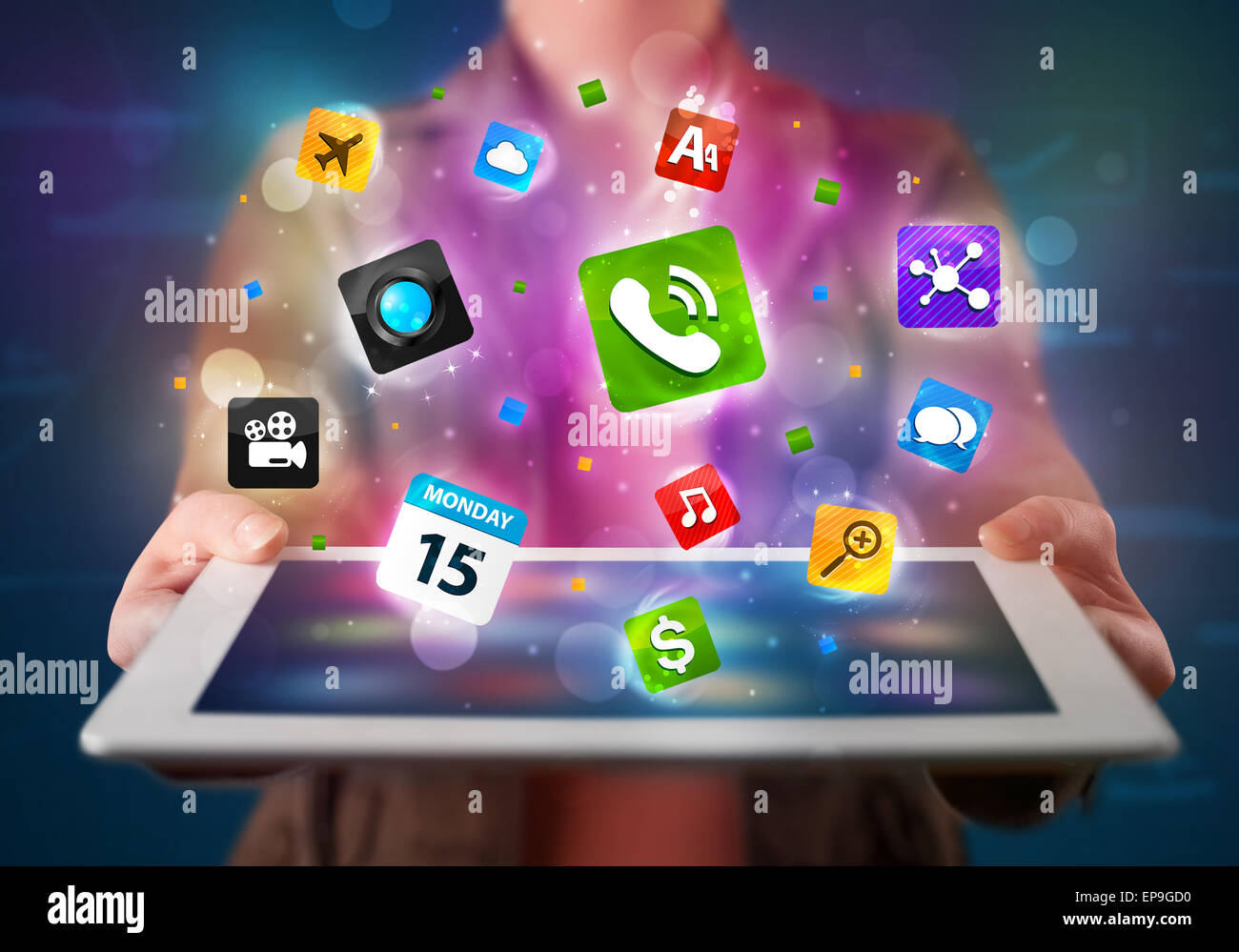 Lady holding a tablet with modern colorful apps and icons Stock Photo ...