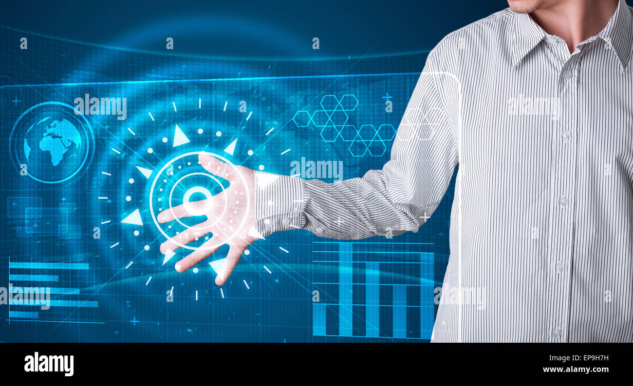 Businessman pressing high tech type of modern buttons Stock Photo - Alamy