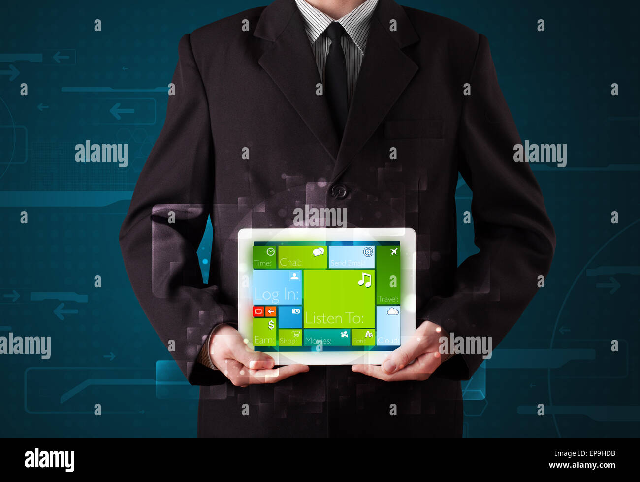Businessman holding a tablet with modern software operational system ...