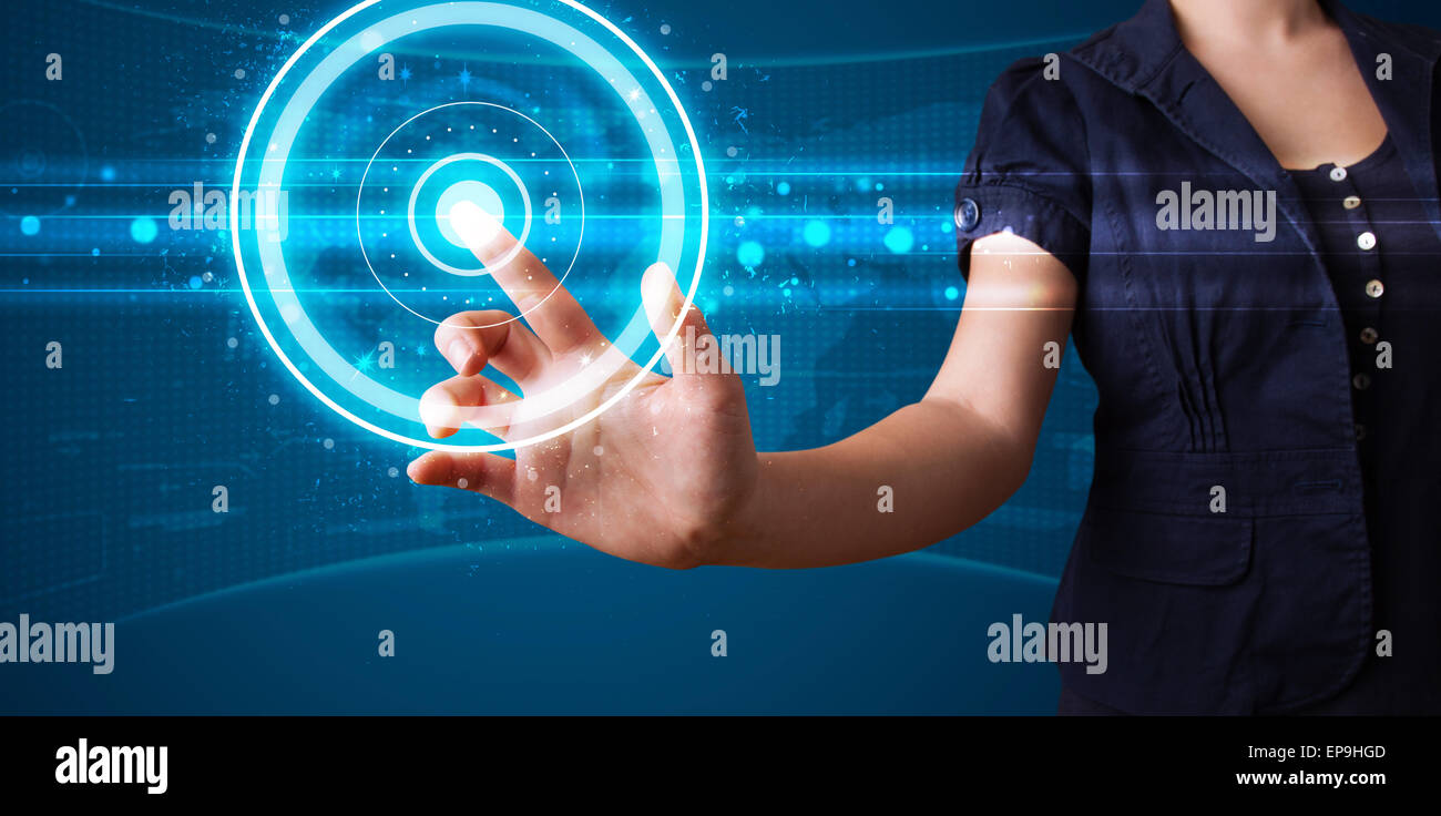 Woman pressing high tech type of modern buttons Stock Photo - Alamy