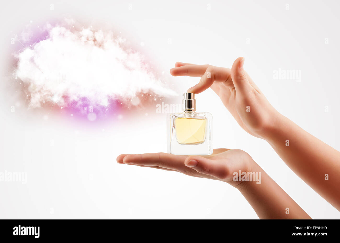 woman hands spraying colorful cloud Stock Photo - Alamy