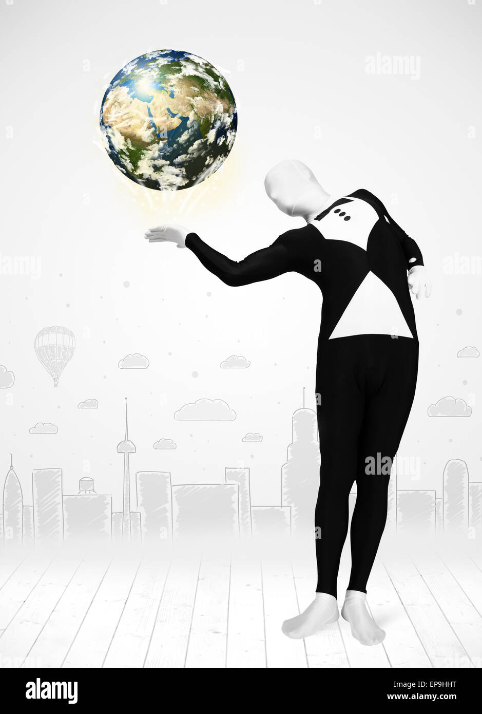 man in full body suit holding planet earth Stock Photo - Alamy