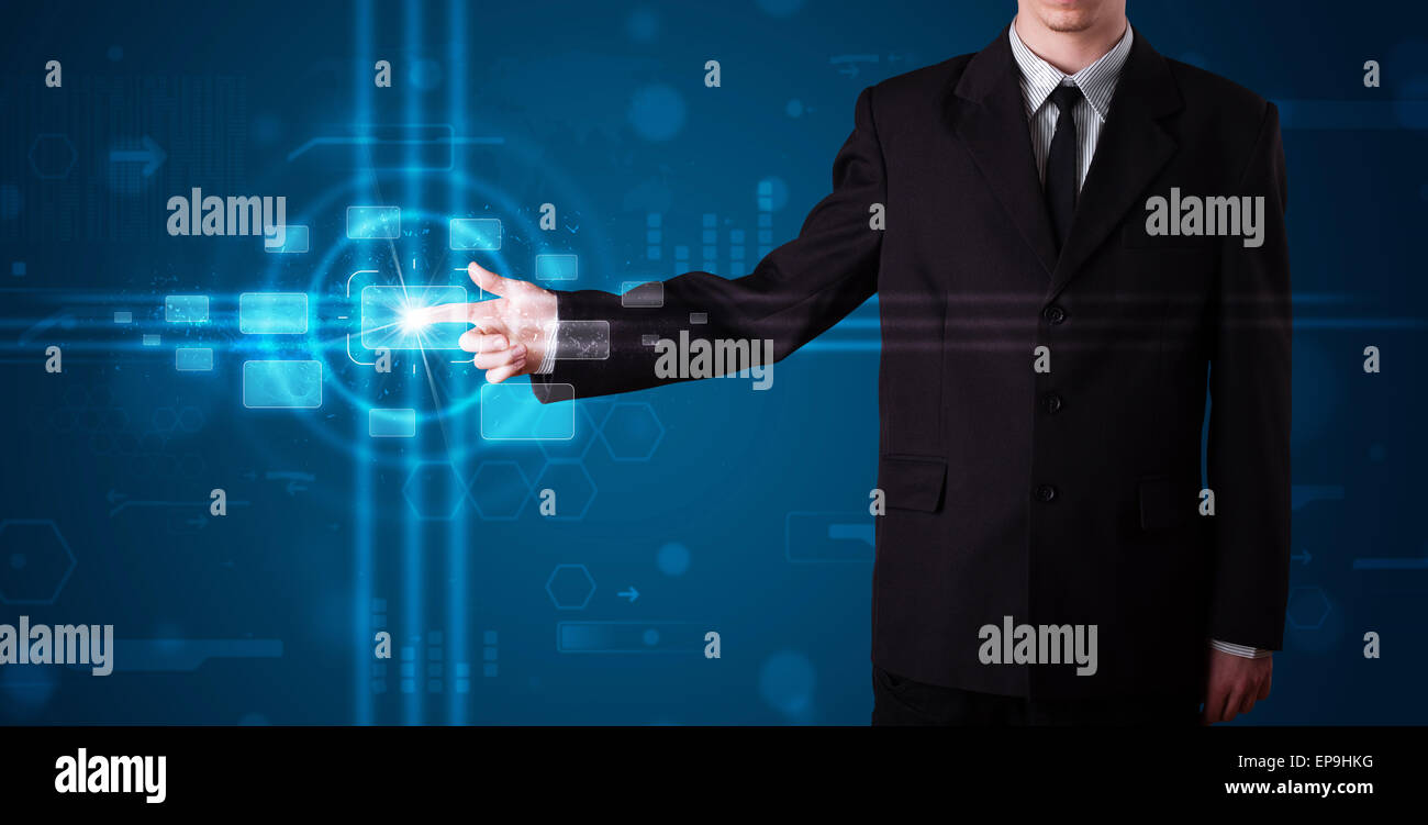 Businessman pressing high tech type of modern buttons Stock Photo - Alamy
