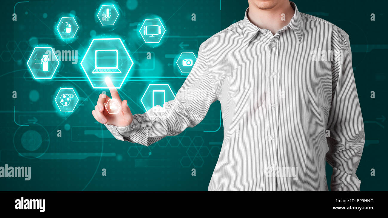 Businessman pressing virtual media type of buttons Stock Photo - Alamy