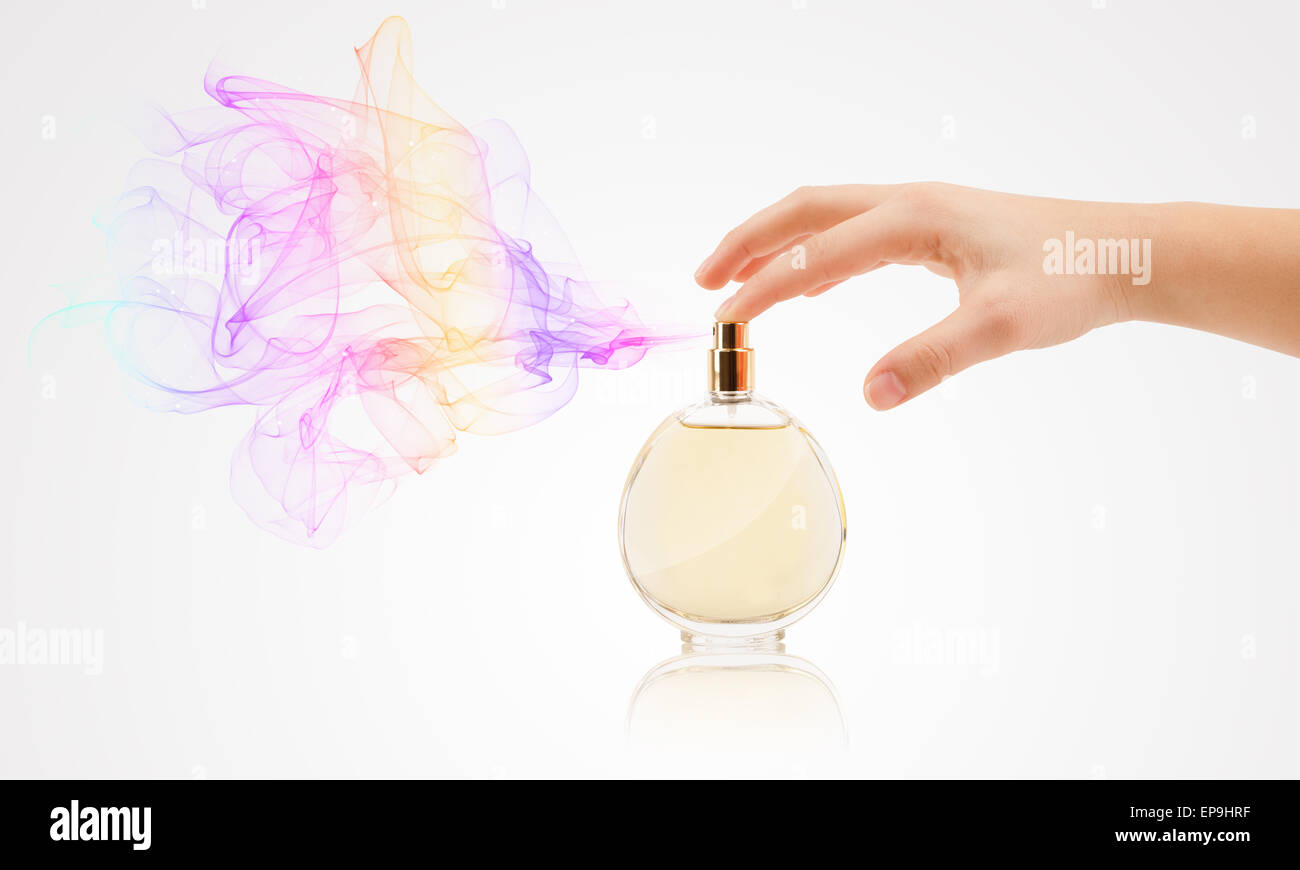 woman hands spraying perfume Stock Photo - Alamy