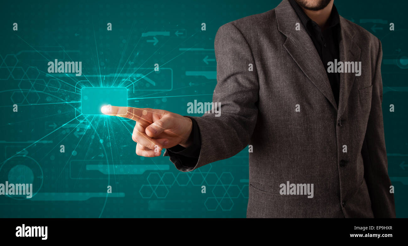 Businessman pressing high tech type of modern buttons Stock Photo - Alamy