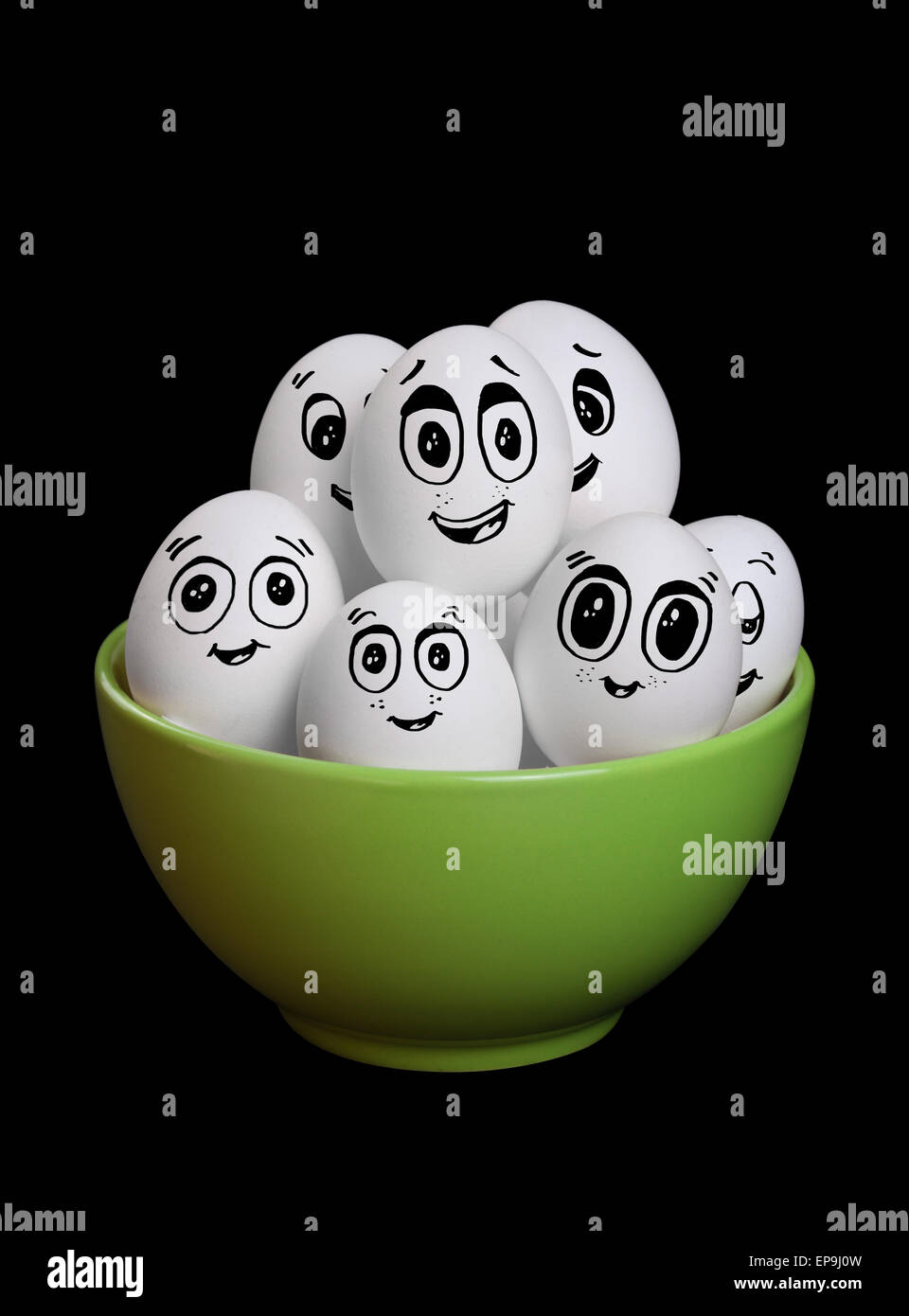 A group of funny and happy egg smiley collection in bowl with black ...