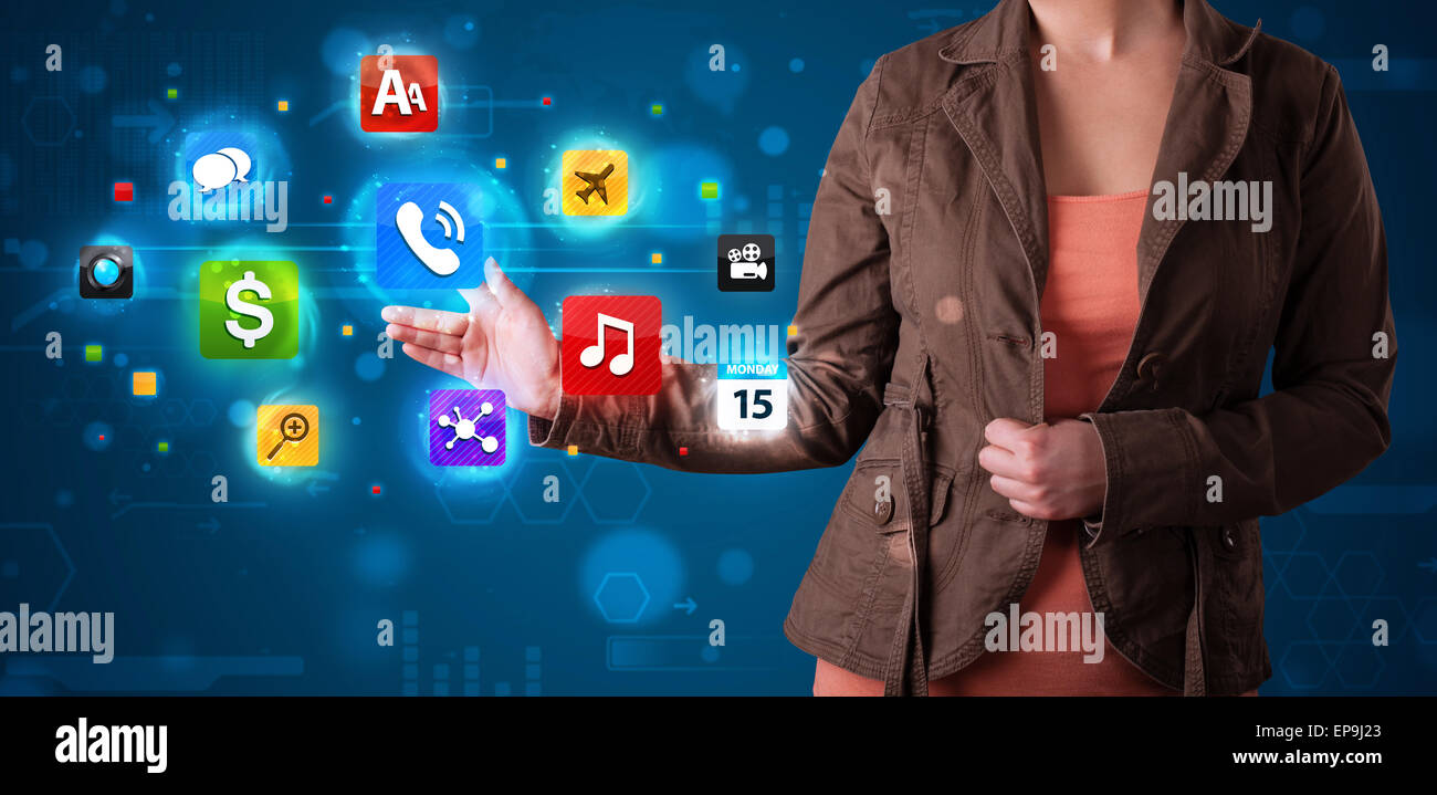 Woman pressing various collection of high tech buttons Stock Photo - Alamy