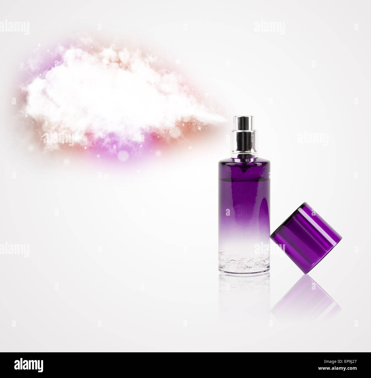 beautiful bottle spraying colorful cloud Stock Photo - Alamy