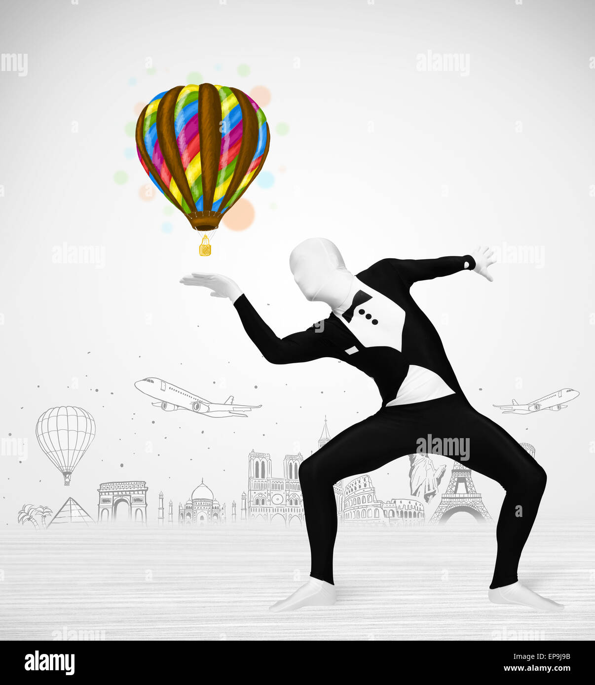 man in full body suit holding balloon Stock Photo - Alamy