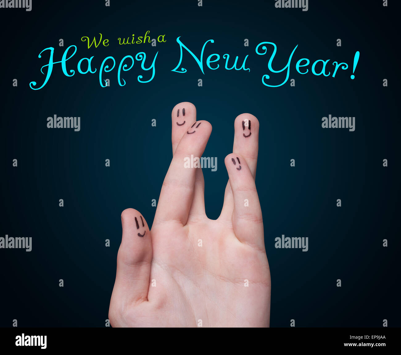 Happy group of finger smileys with happy new year sign on blue ...