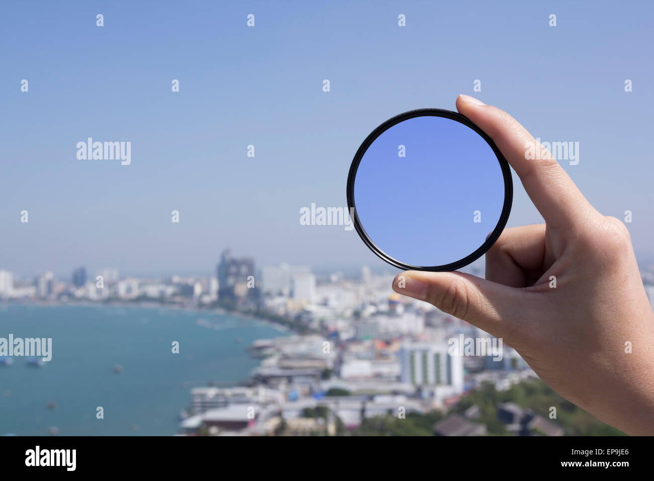 hand is holding filter with landscape Stock Photo - Alamy