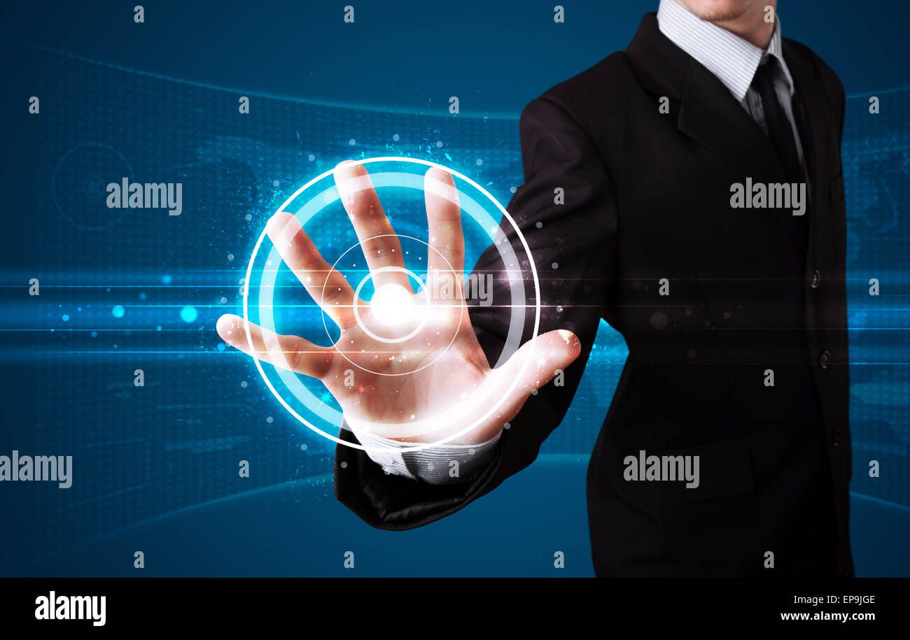 Businessman pressing high tech type of modern buttons Stock Photo - Alamy
