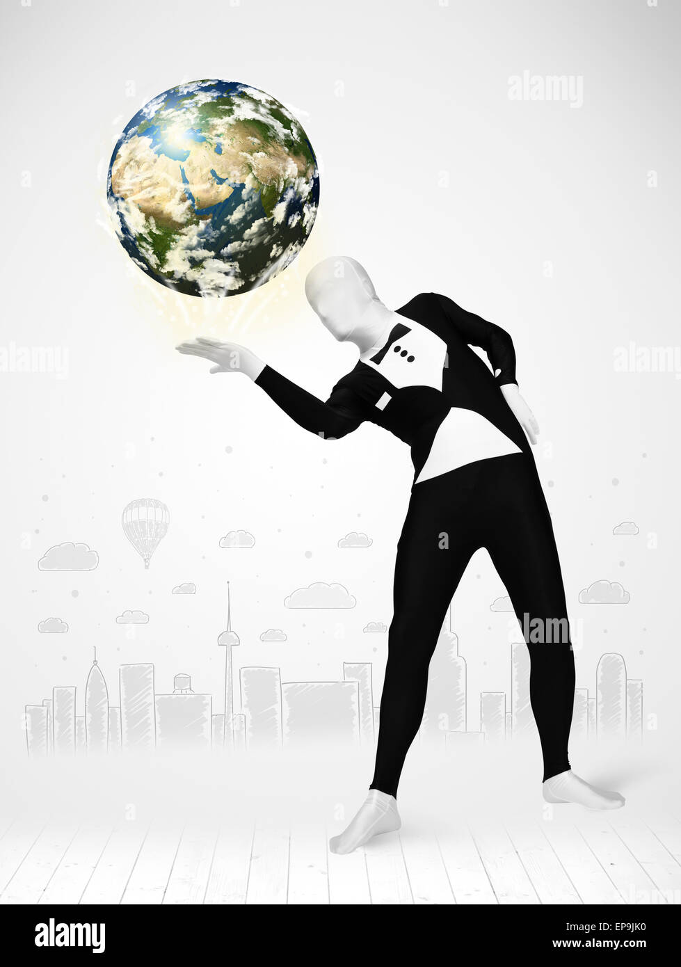 man in full body suit holding planet earth Stock Photo - Alamy