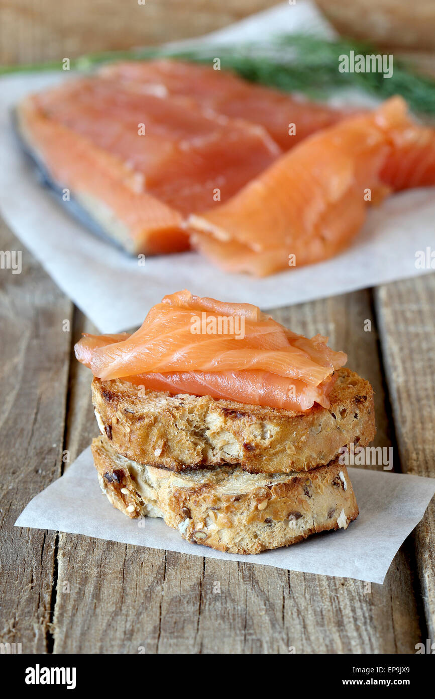 Smoked salmon on toast Stock Photo - Alamy